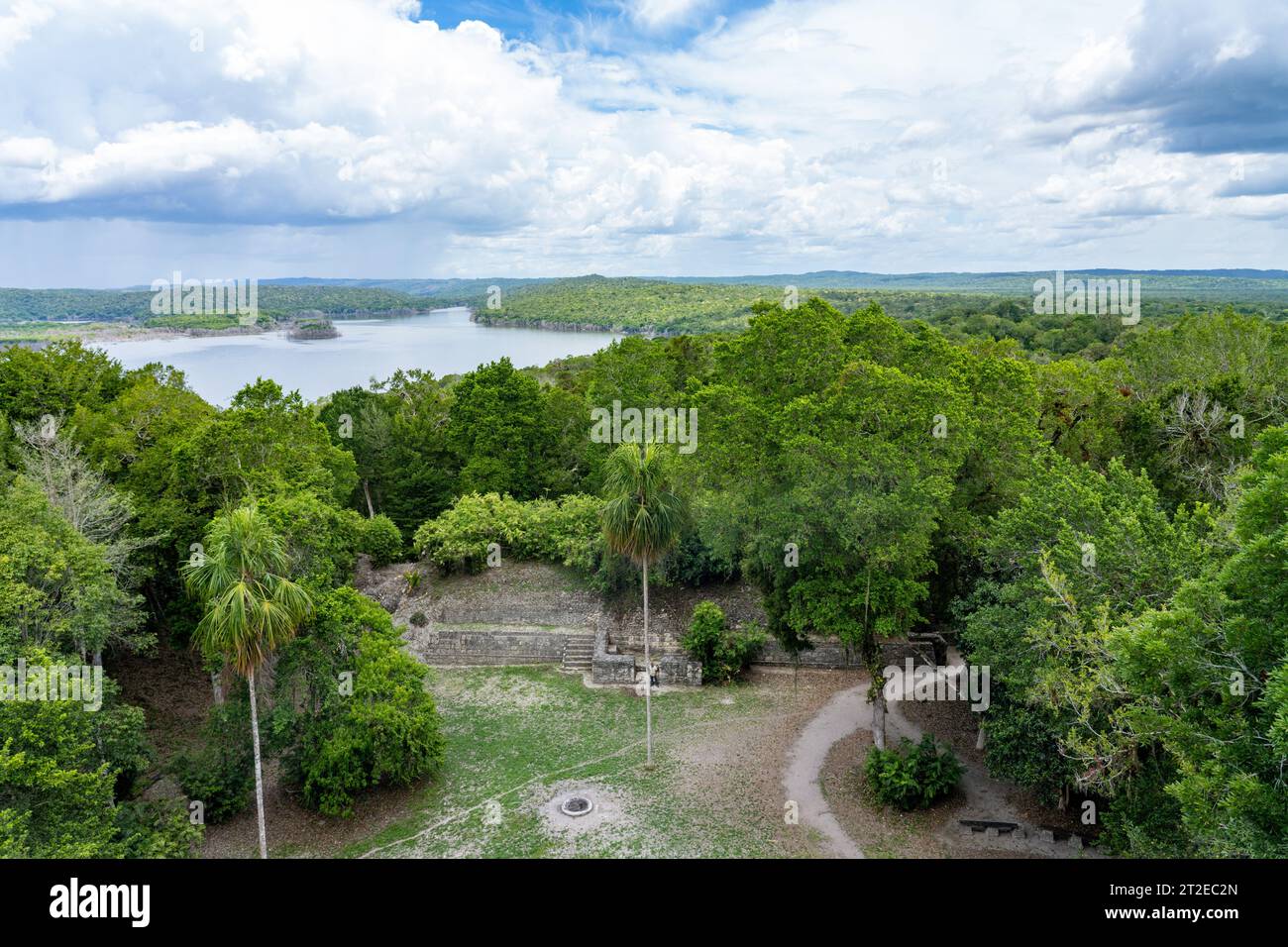 View of Lake Yaxha & Plaza E from the top of Structure 216 in the Mayan ...