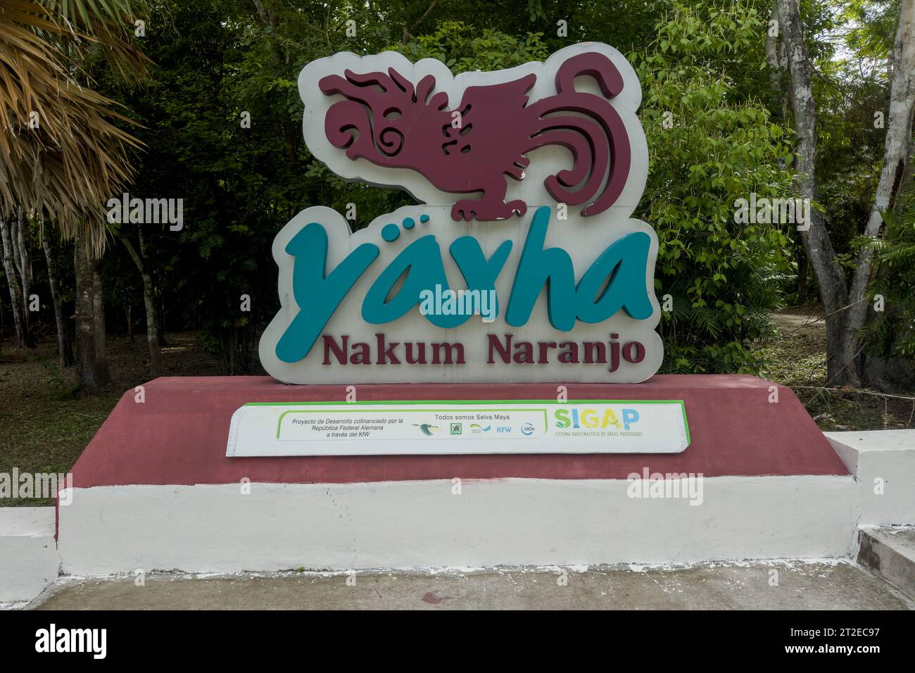 A sign with the Yaxha name glyph at the visitors center at the Mayan ...