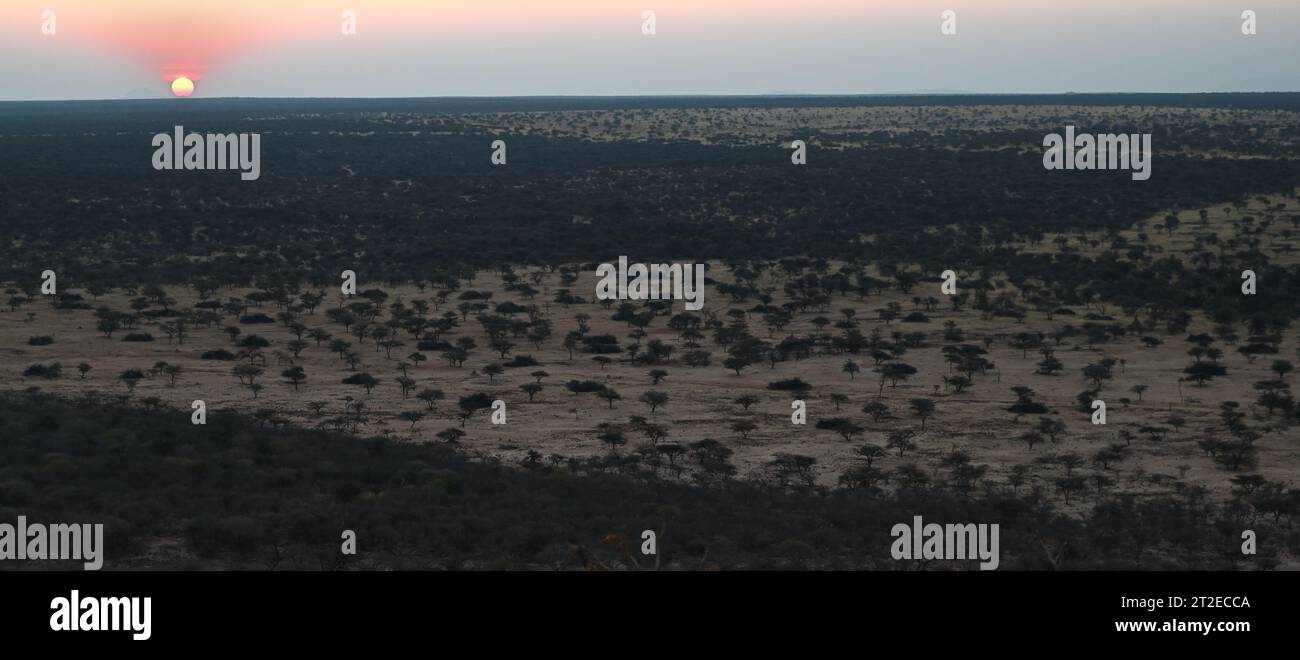sunset with long distance view in the Okonjima Nature Reserve, Namibia ...