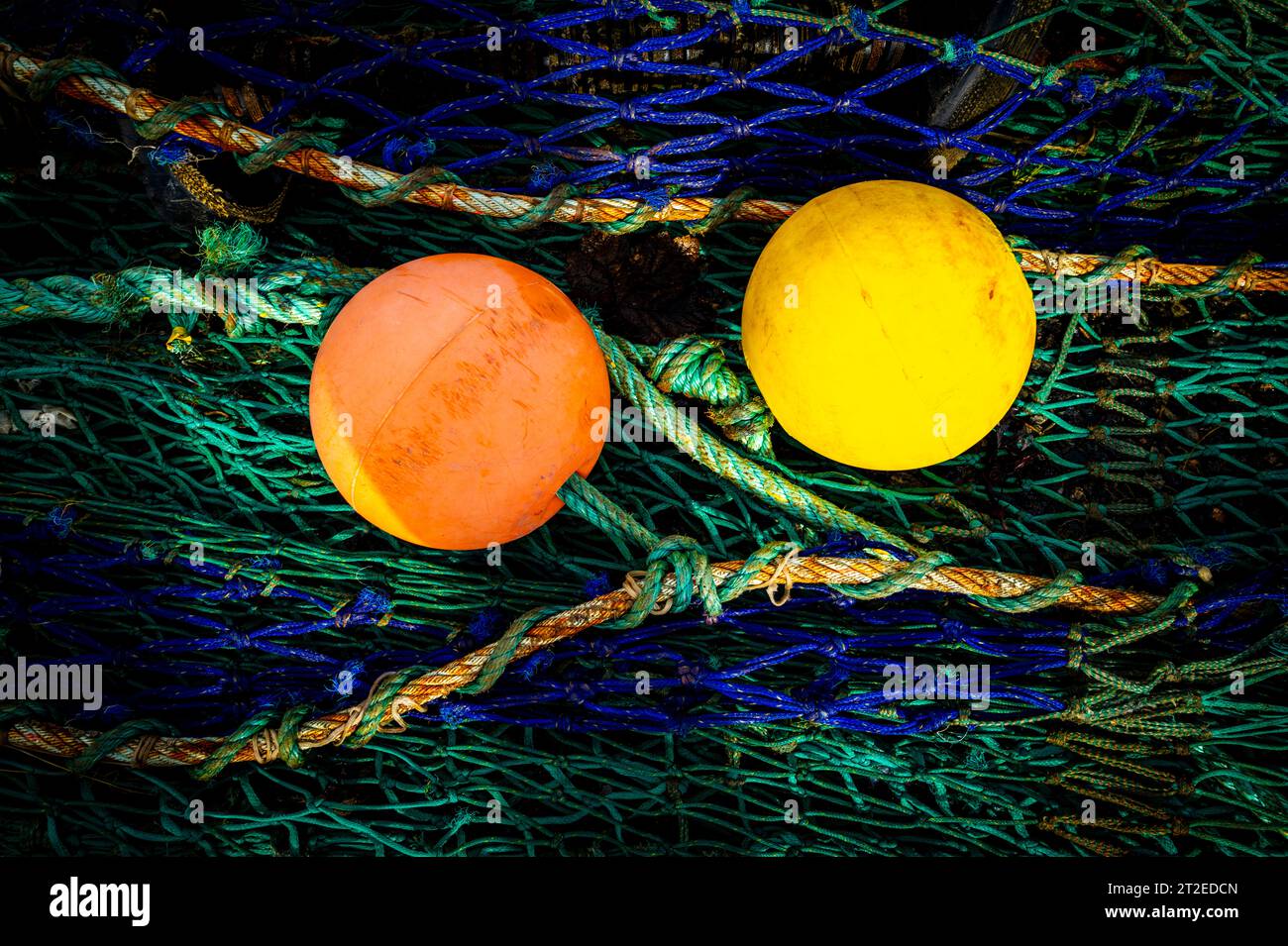 fishing buoys and nets in the harbour in Stornoway, Island of Lewis ...