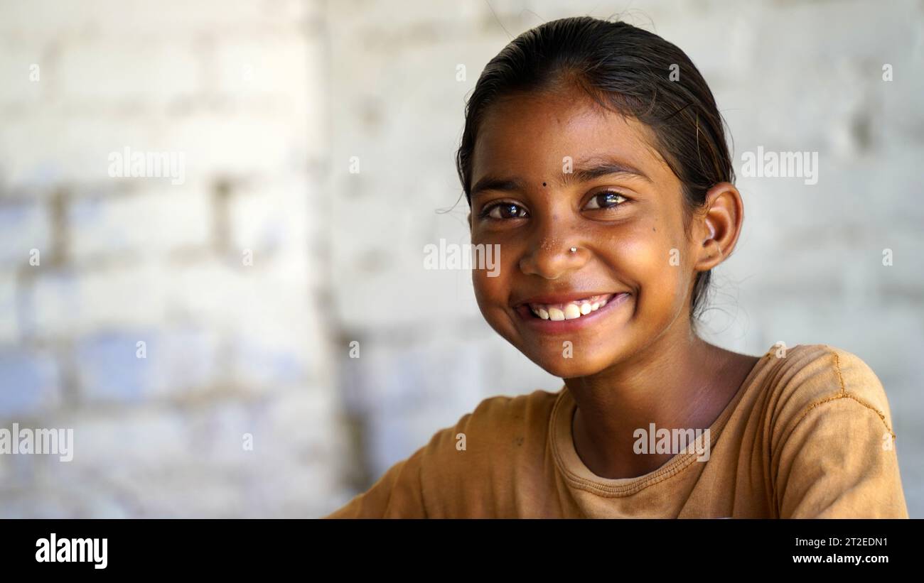 Happy Indian elementary school girls students sitting at desk in ...