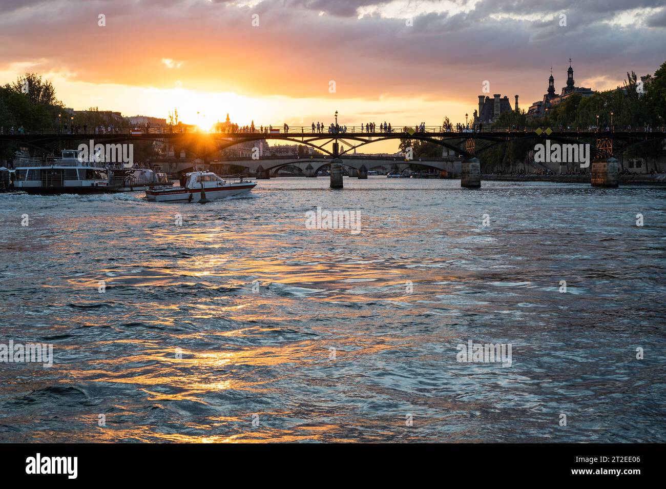 Paris, France - August 26 2022: Sunset at Bridge Pont des Arts ...