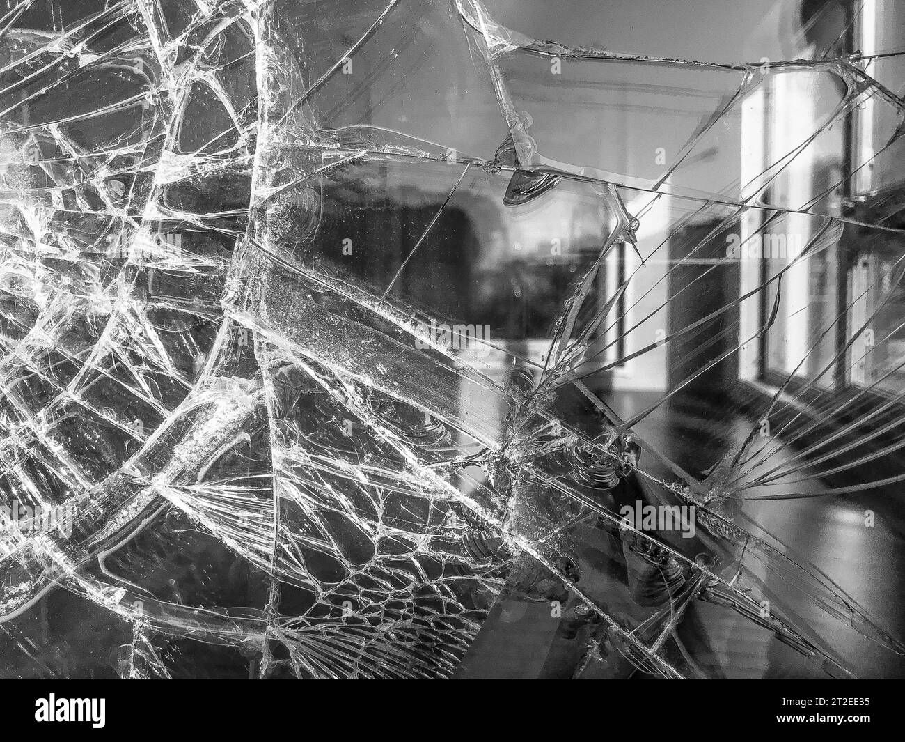 The texture of the broken cracked thick fragile broken sharp glass ...