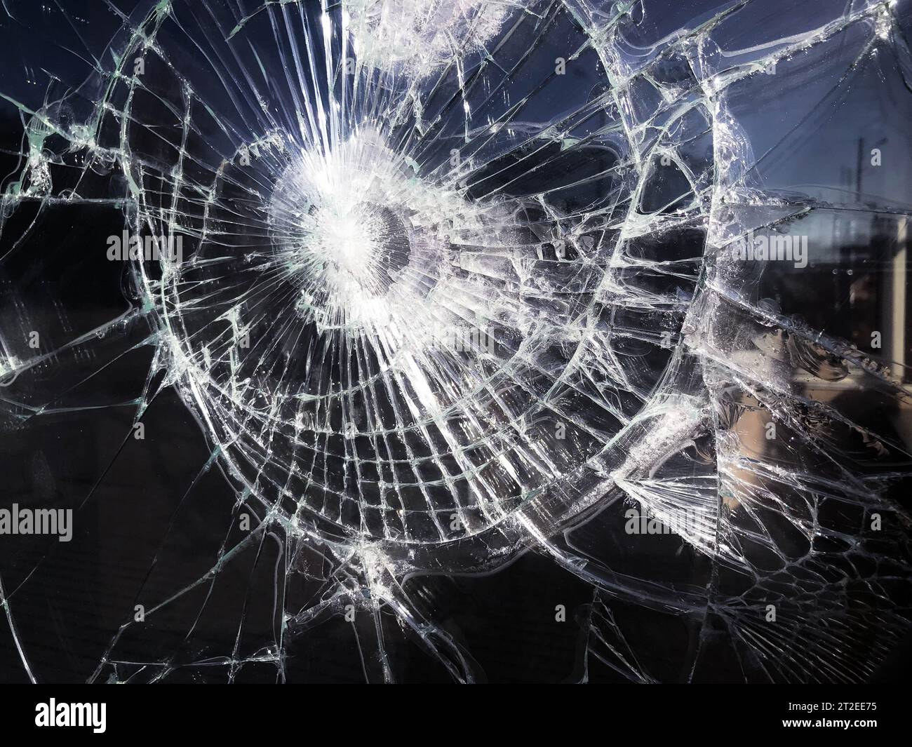 The texture of the broken cracked thick fragile broken sharp glass ...