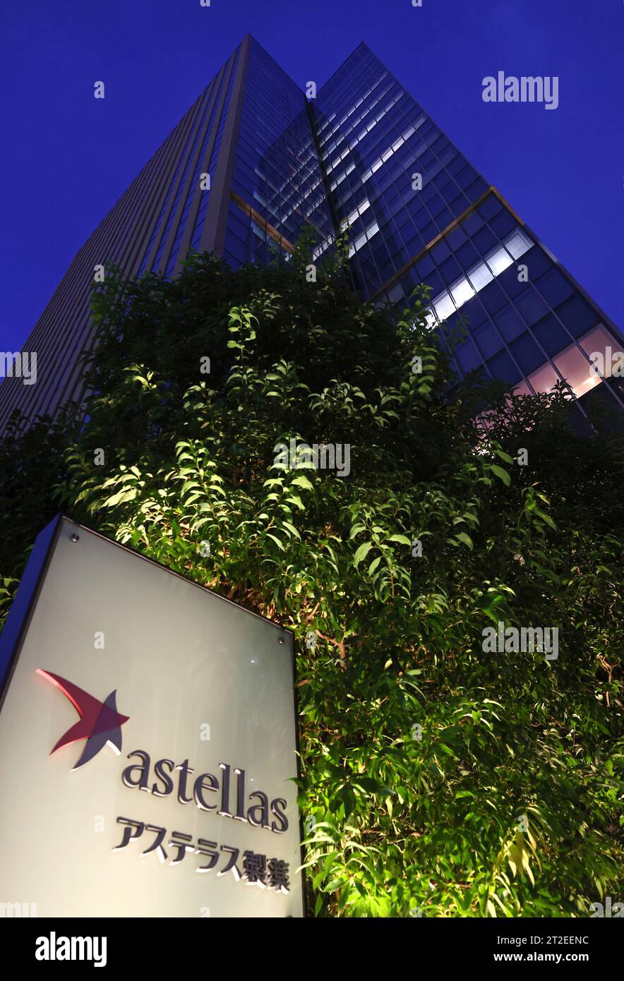 A logo and the headquarters building of Astellas Pharma Inc. are seen ...
