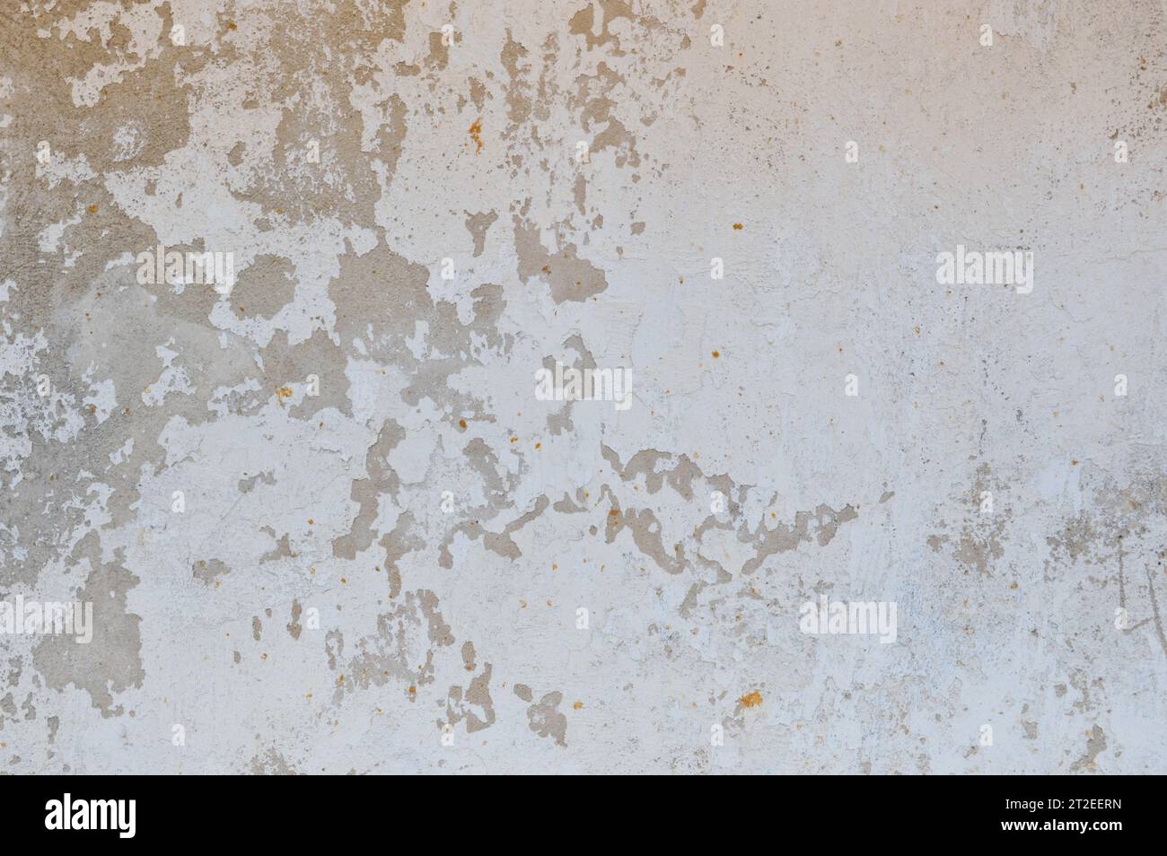 The texture of the stone concrete old shabby wall with cracks and chips ...