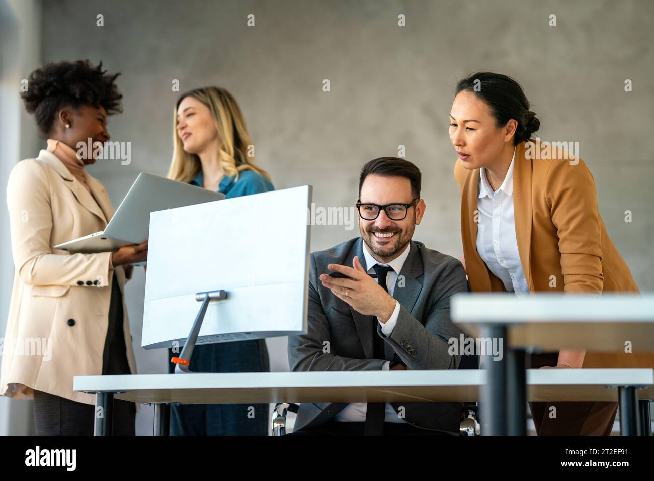 Group of happy multiethnic business people in formal wear gathered ...