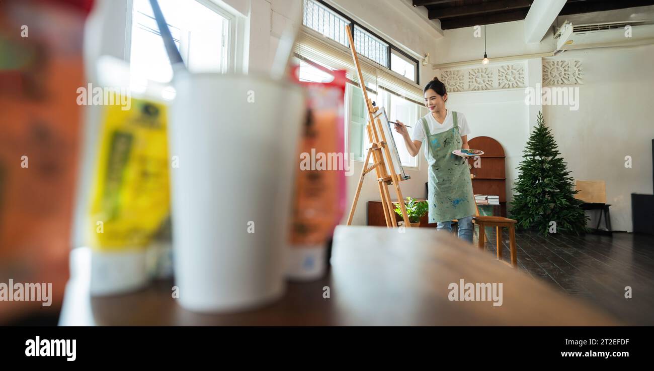 Talented Female Artist Working on a artist lifestyle. painting hobby ...