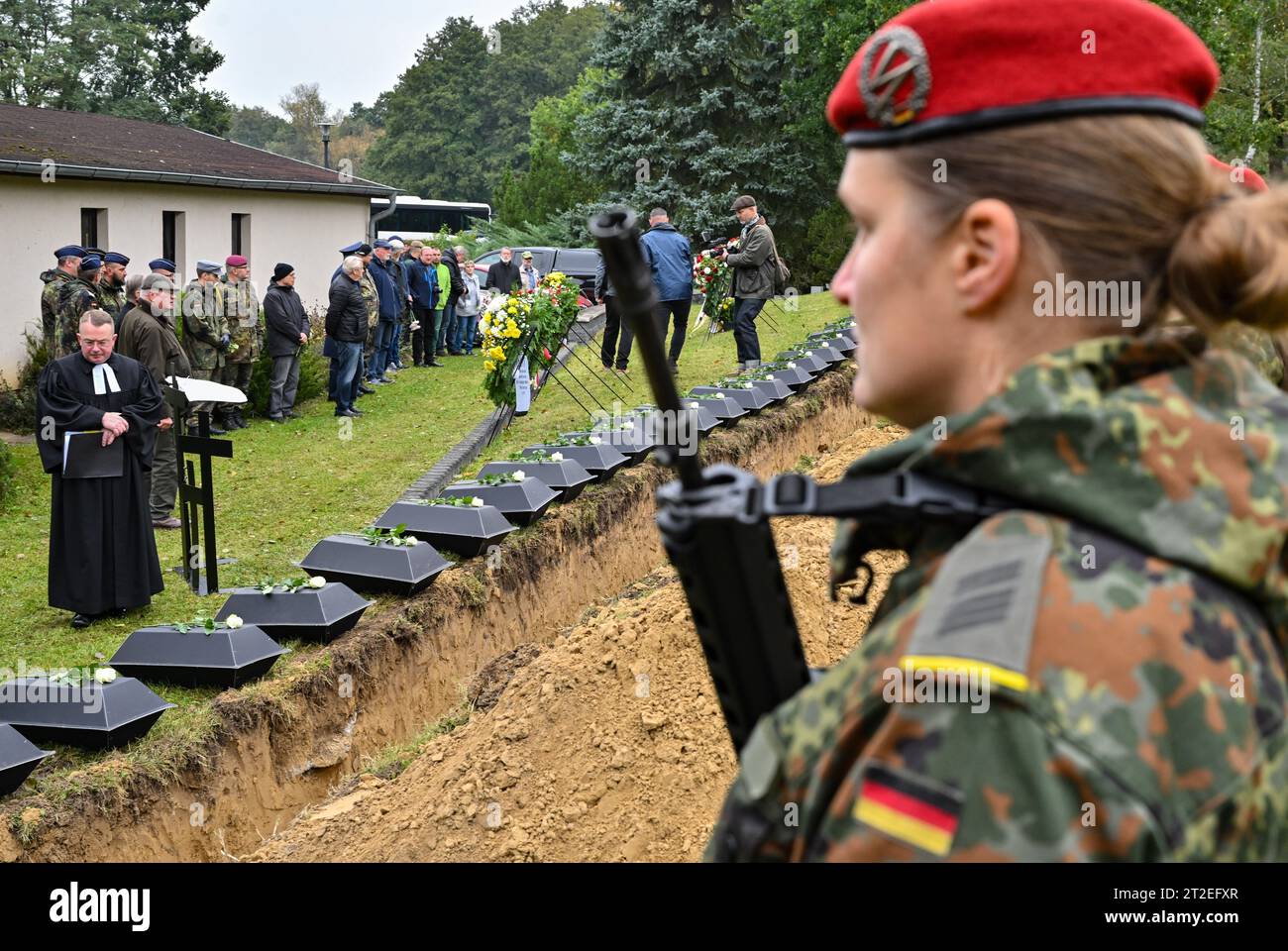 19 October 2023, Brandenburg, Lietzen: Small coffins containing the ...