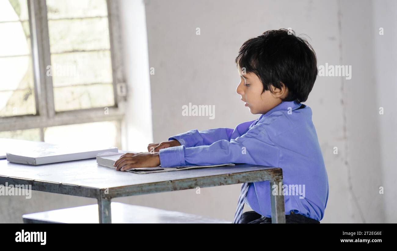 Indian school children writing hi-res stock photography and images - Alamy