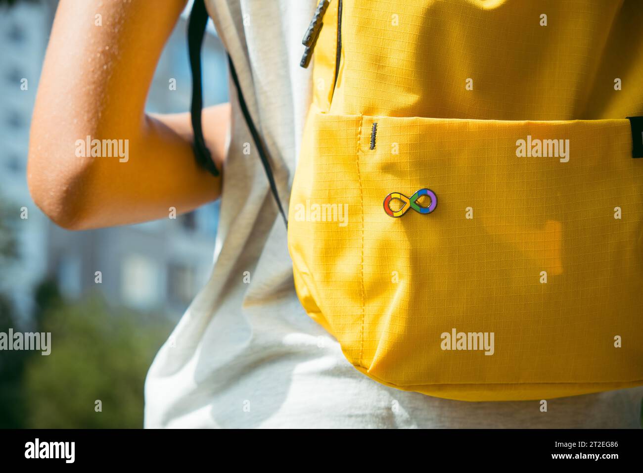 Kid with backpack with autism infinity rainbow symbol sign. World ...