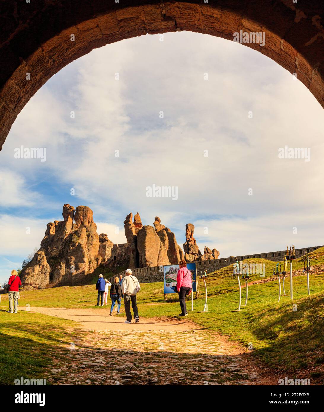 Group of active seniors hiking and climbing the steps leading to ...