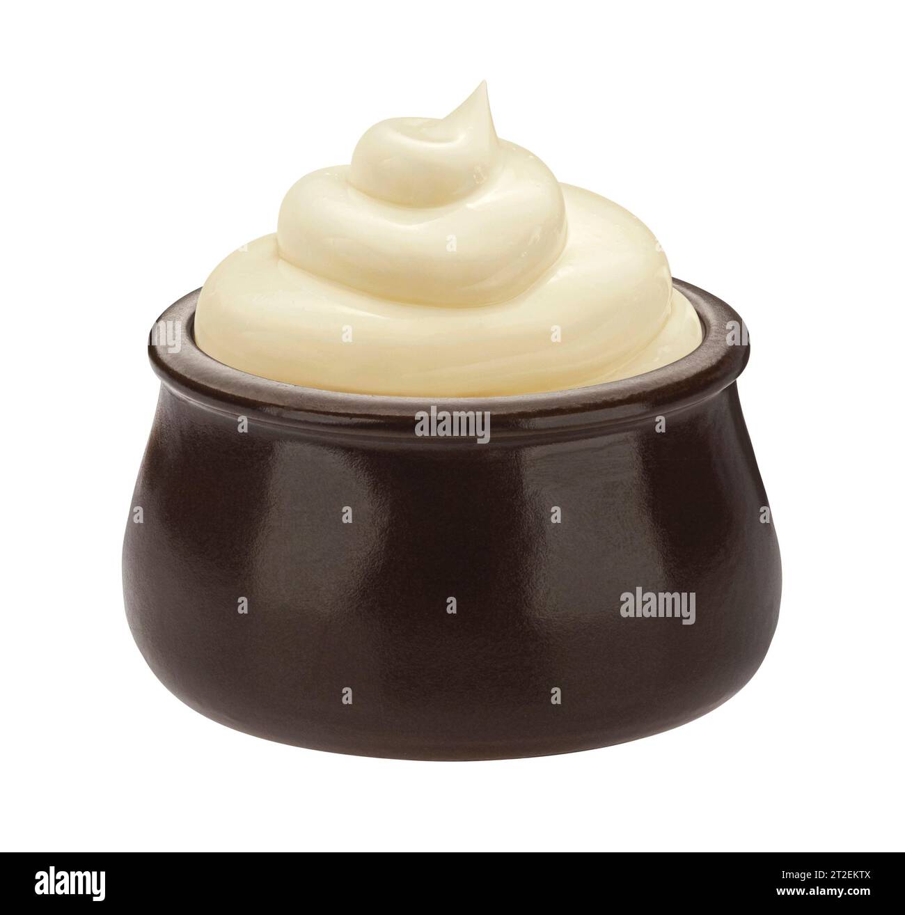 Mayonnaise swirl in small clay pot isolated on white background Stock ...