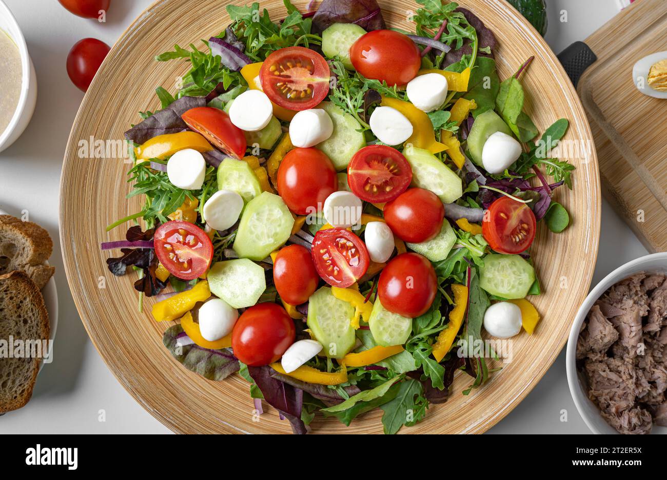 Vegetable salad with mozzarella and lettuce Stock Photo - Alamy