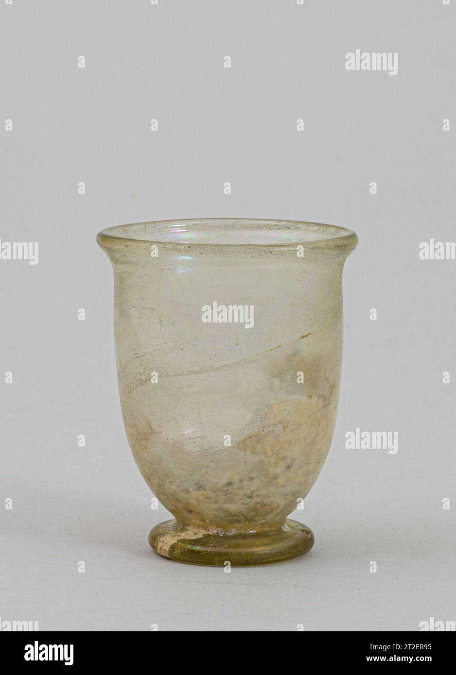 Glass cup Roman 3rd–4th century CE Small cup.Colorless with a yellow ...