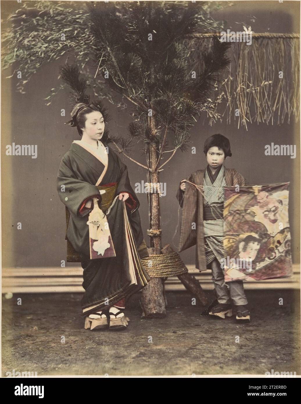 [A Japanese Woman and a Japanese Boy in Traditional Dress] Suzuki Shin'ichi Japanese 1870s Stock ...