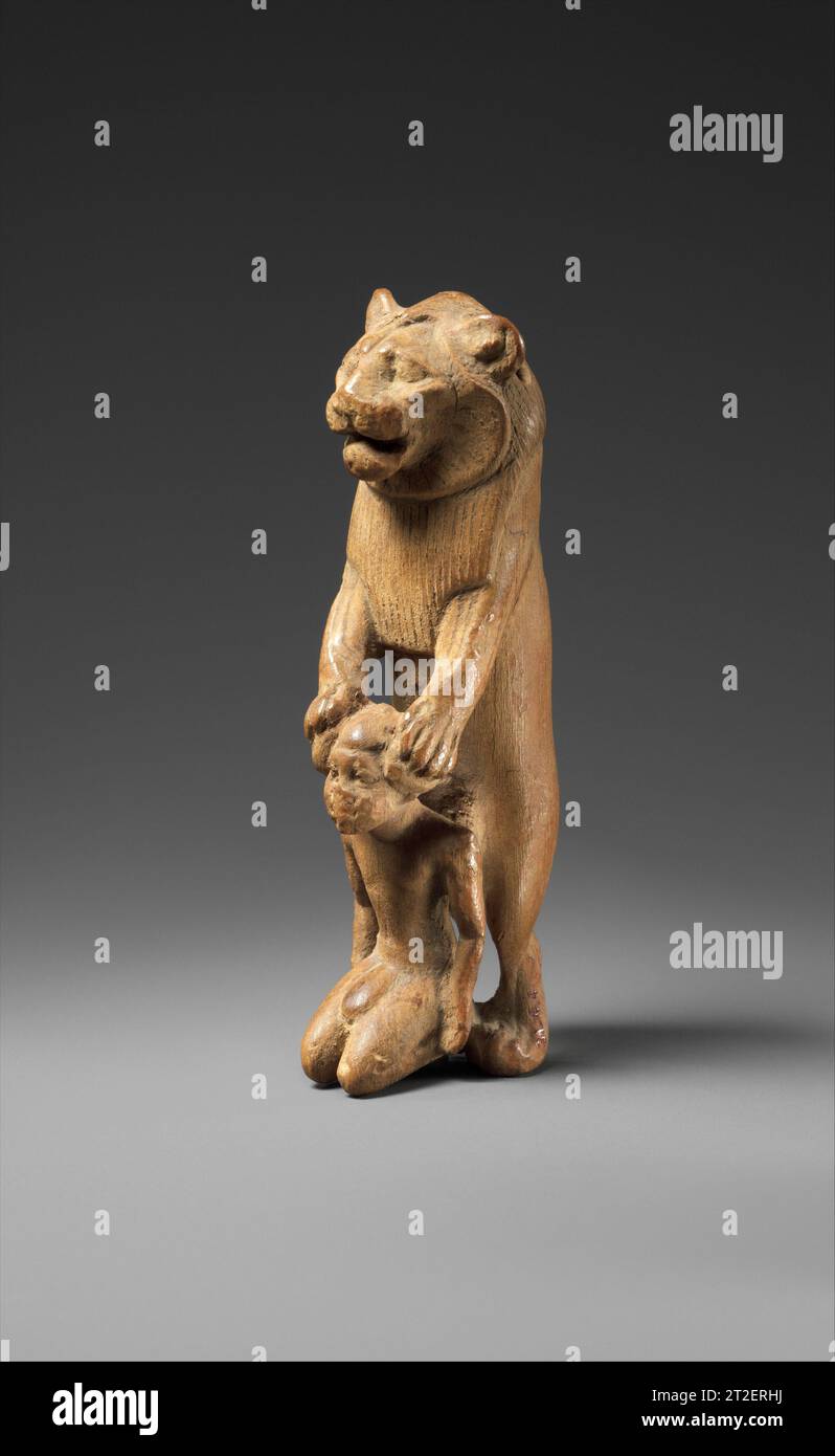 Statuette of lion holding a Nubian captive Late Middle Kingdom or ...