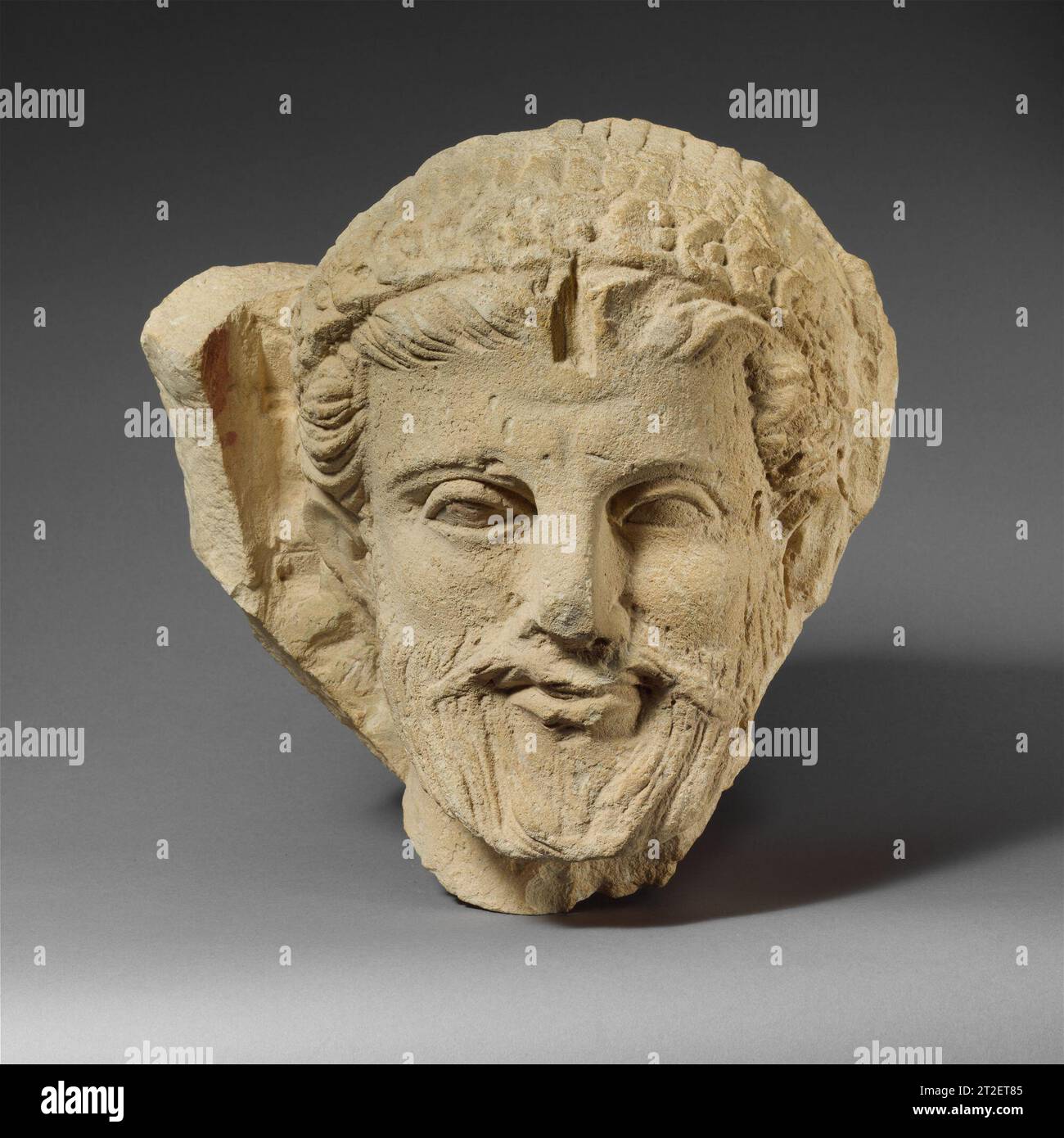 Limestone head of a bearded man from a funerary stele Cypriot Early ...