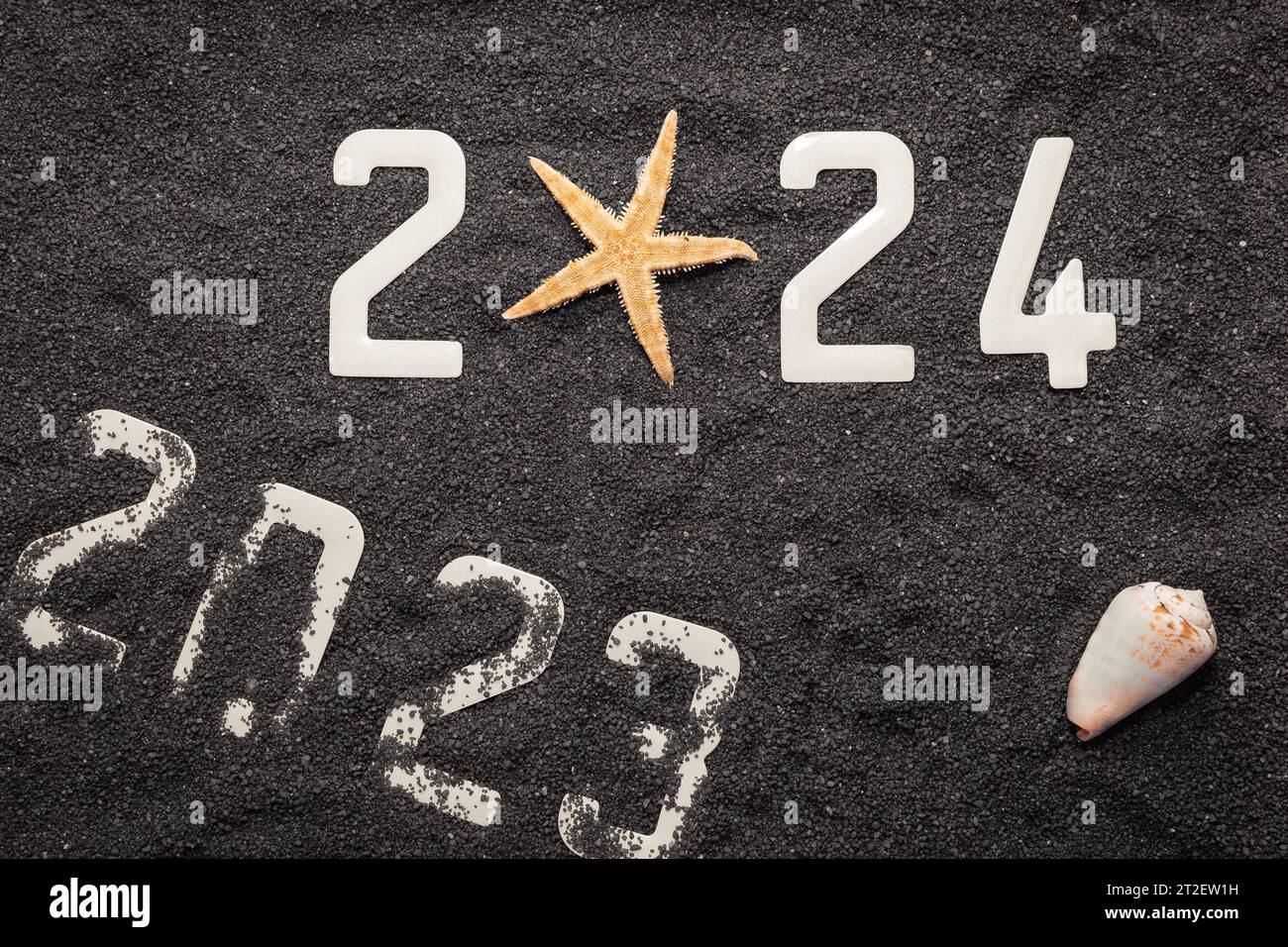 Happy New Year 2024: New Year 2024 concept on the black sand of a beach ...