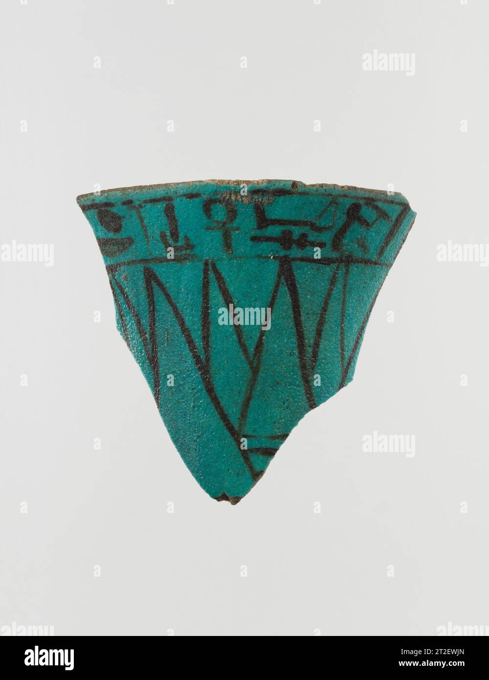 Lotiform chalice fragment with painted petals and inscription band ...