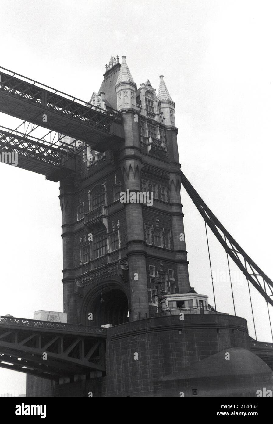 1960s, historical, view from below of a tower at Tower Bridge, London ...