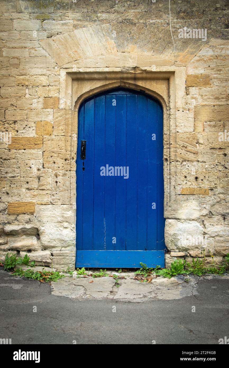Blue door near Burford High Street, a picturesque English town in the ...