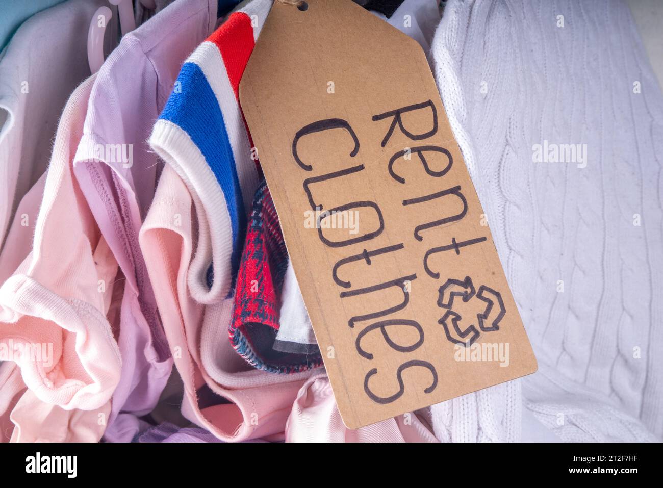 Clothing rental services background, with various woman, man, kids ...