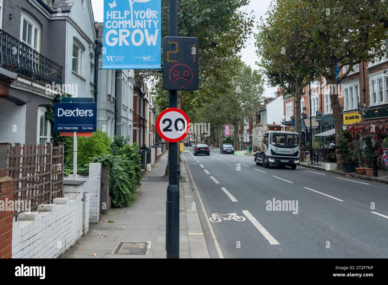 London- October 2, 2023: 20mph sign and a speedometer which shows a ...