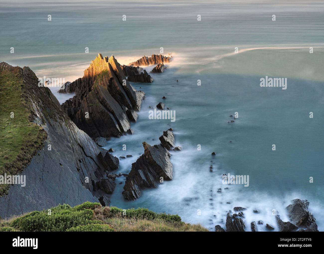 Hartland quay North Devon long exposure light on the rocks Stock Photo ...