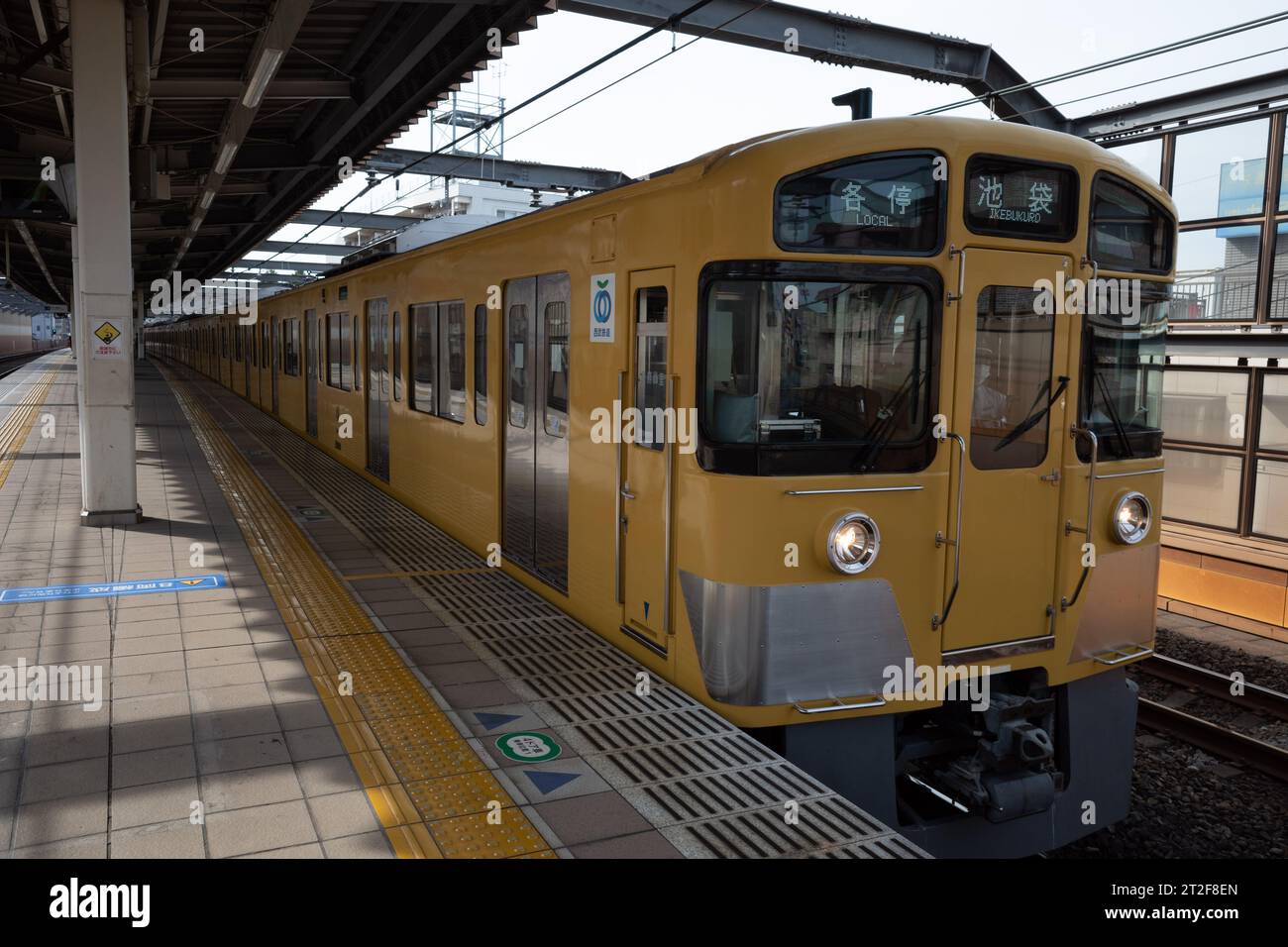Tokyo, Japan. 19th Oct, 2023. A local train on the Seibu Ikebukuro line departs a station bound ...