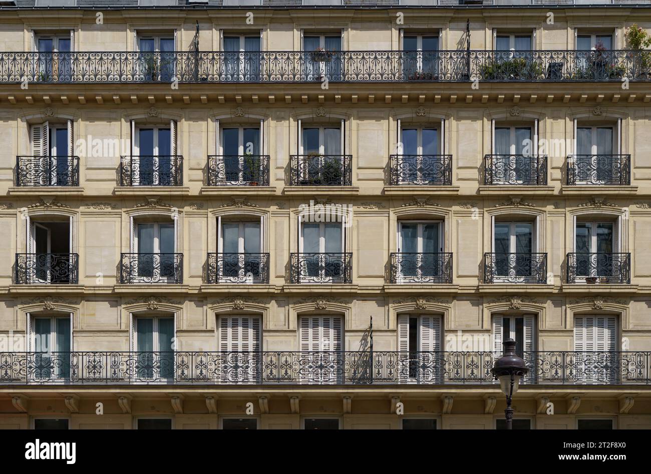 Large classic residential building in center of Paris. Traditional ...