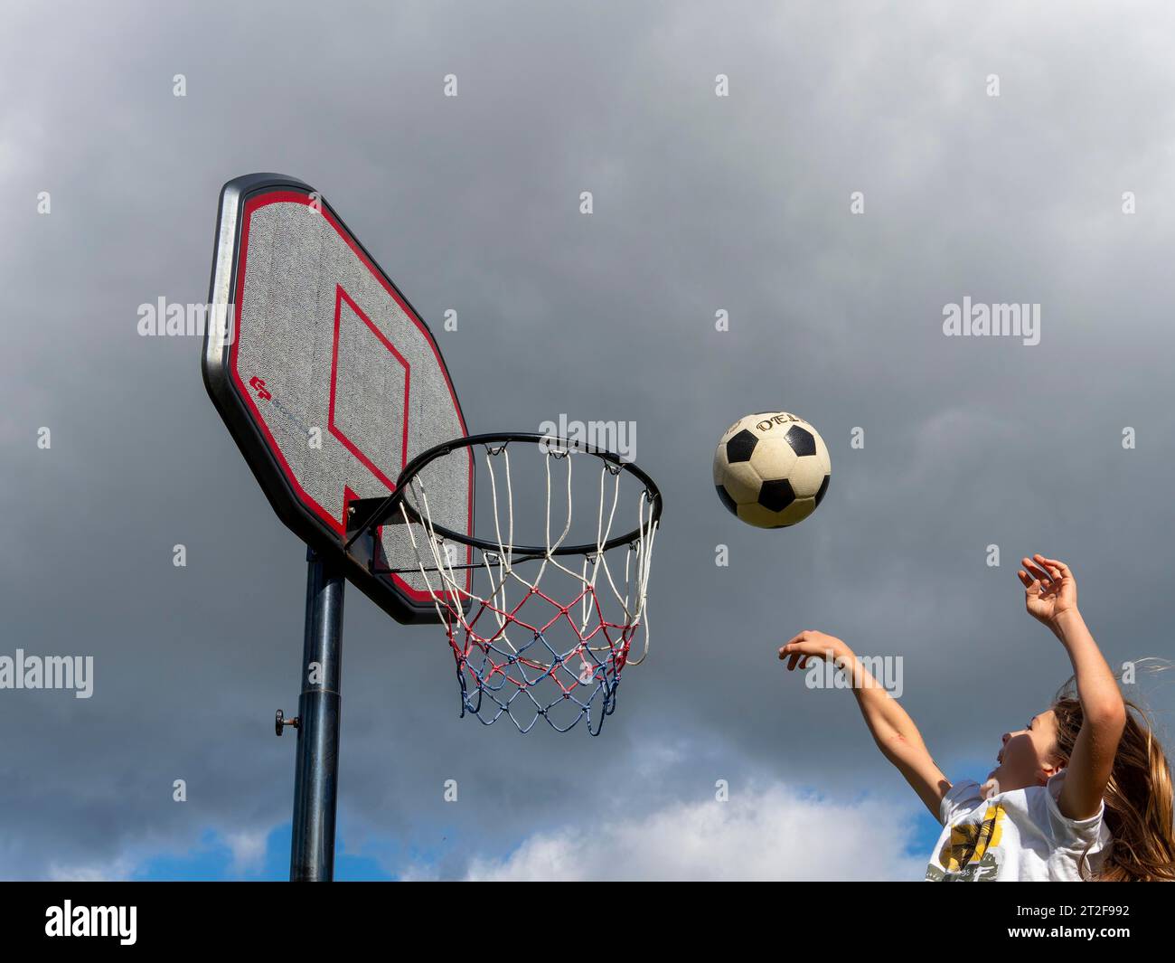 Basketball Jump with the ball to the basket and net, boy 10 years ...