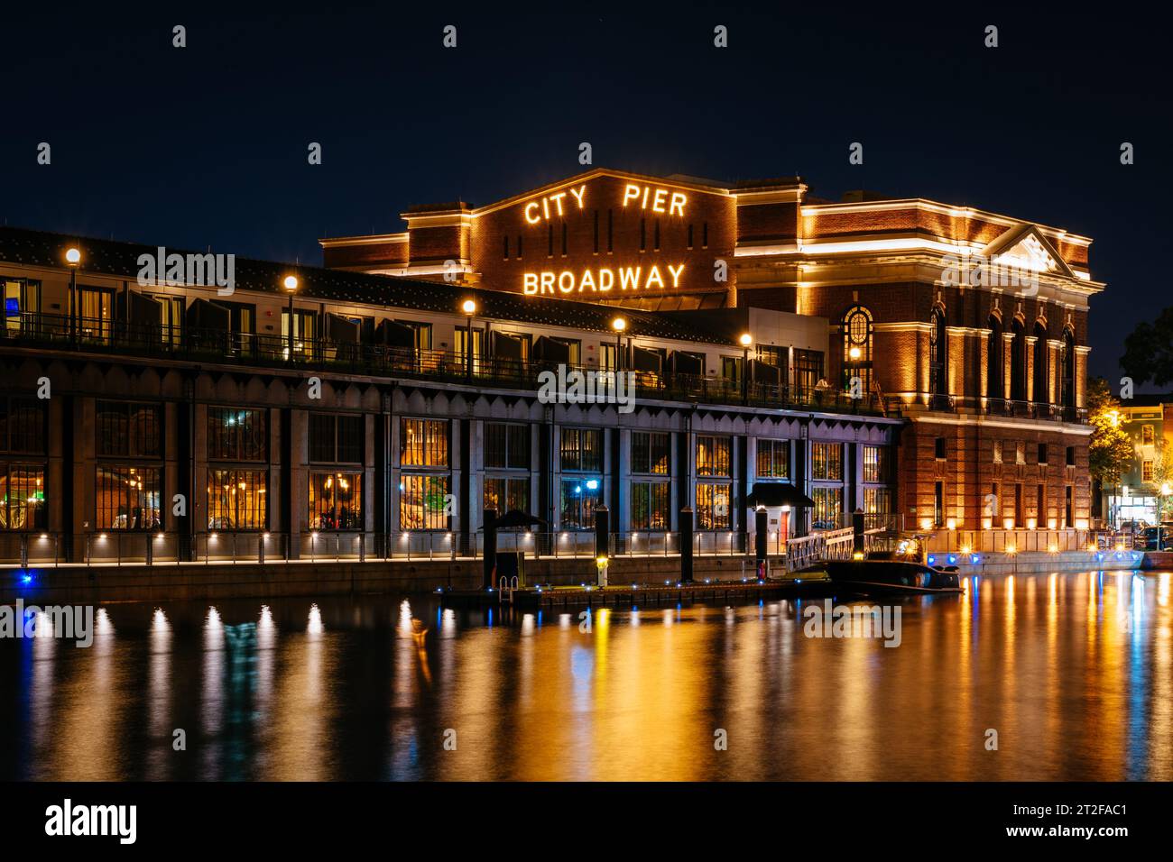 The historic Broadway Pier at night, in Fells Point, Baltimore ...