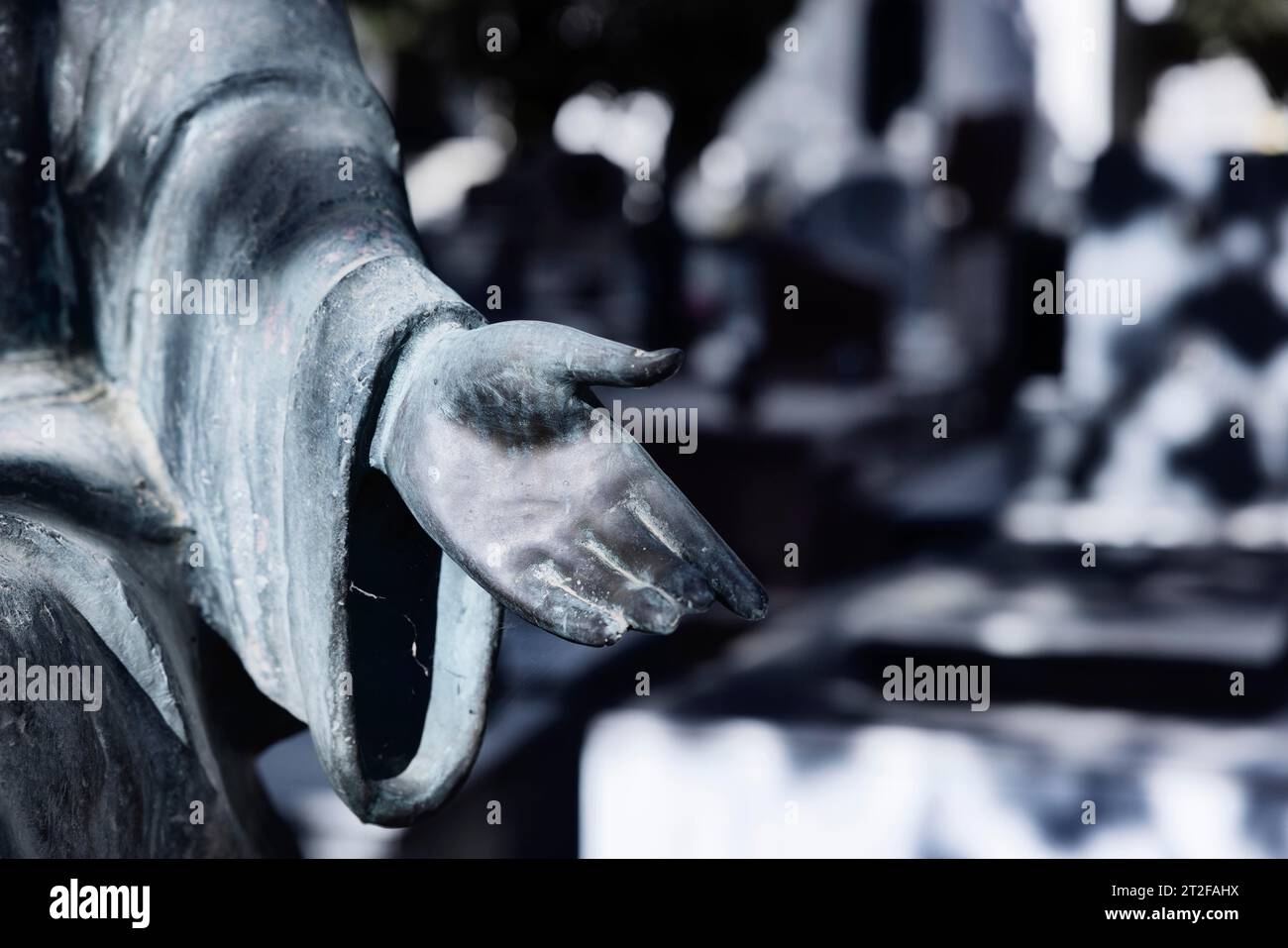 Hand of God, Opened hand of a god figure on a grave in a cemetery, Bari ...