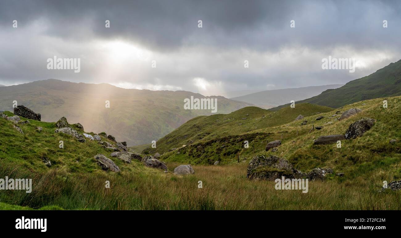 Typical landscape with mountains behind clouds in late summer ...