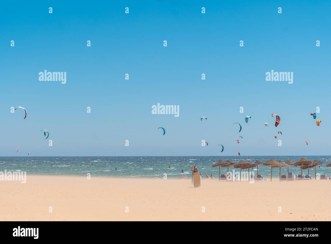 Windy morning ideal for kitesurfing on the beach. Extreme sport ...