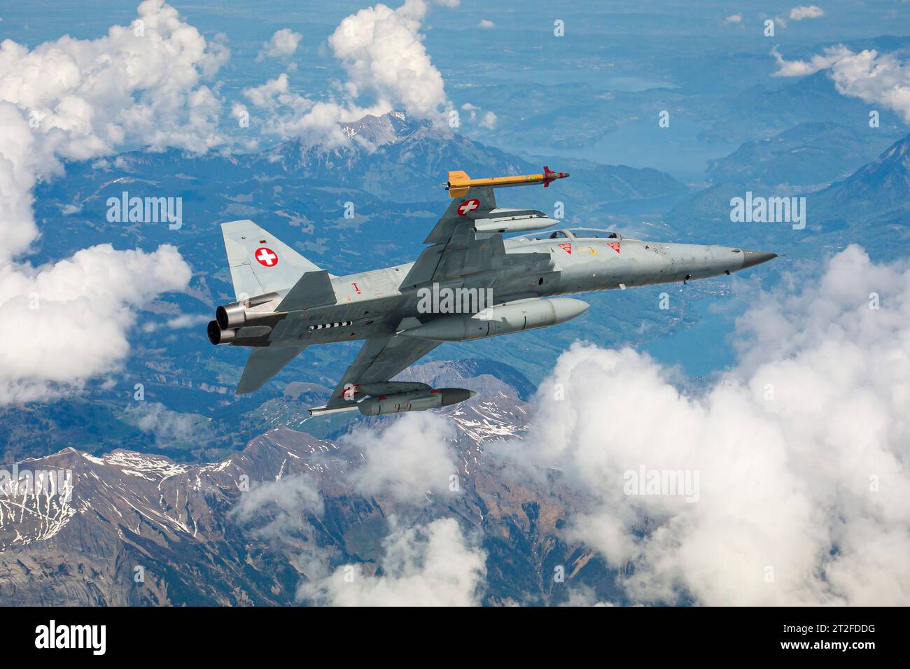 A Swiss Air Force F-5F TIger II flying over the outskirts of the Swiss ...