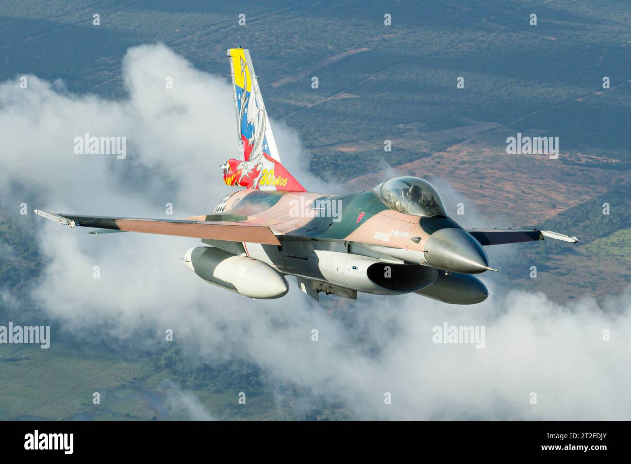 A Venezuelan Air Force F-16 Fighting Falcon flying over Brazil Stock ...