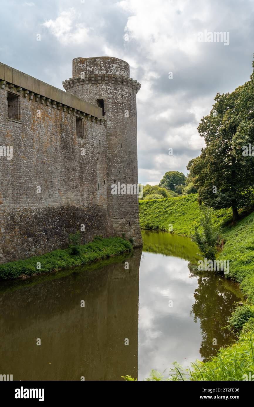 Ramparts and water surrounding the medieval Hunaudaye Castle, French ...