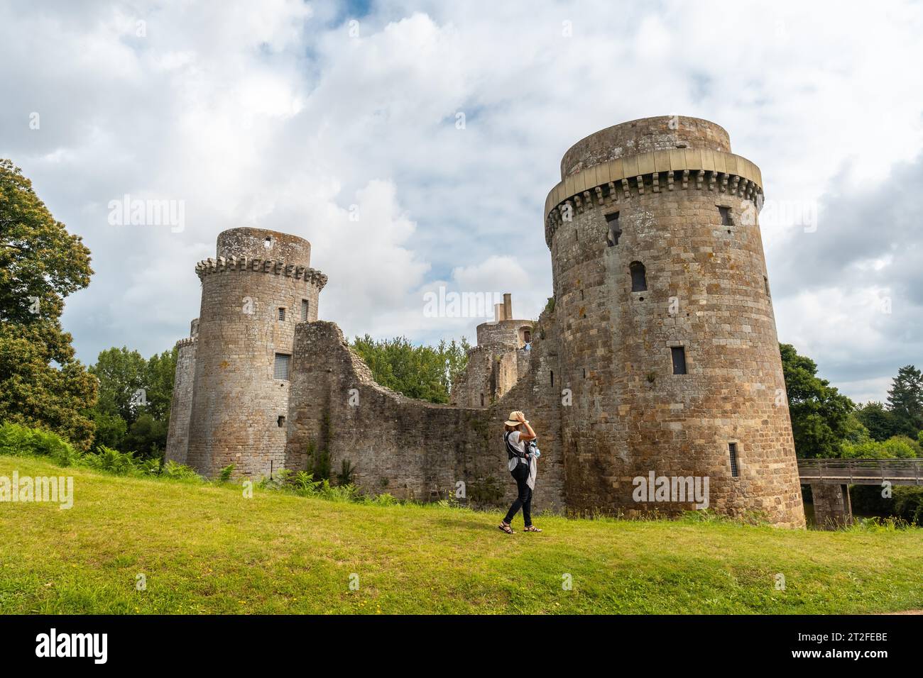 A young mother and her baby visiting the walls of the medieval ...