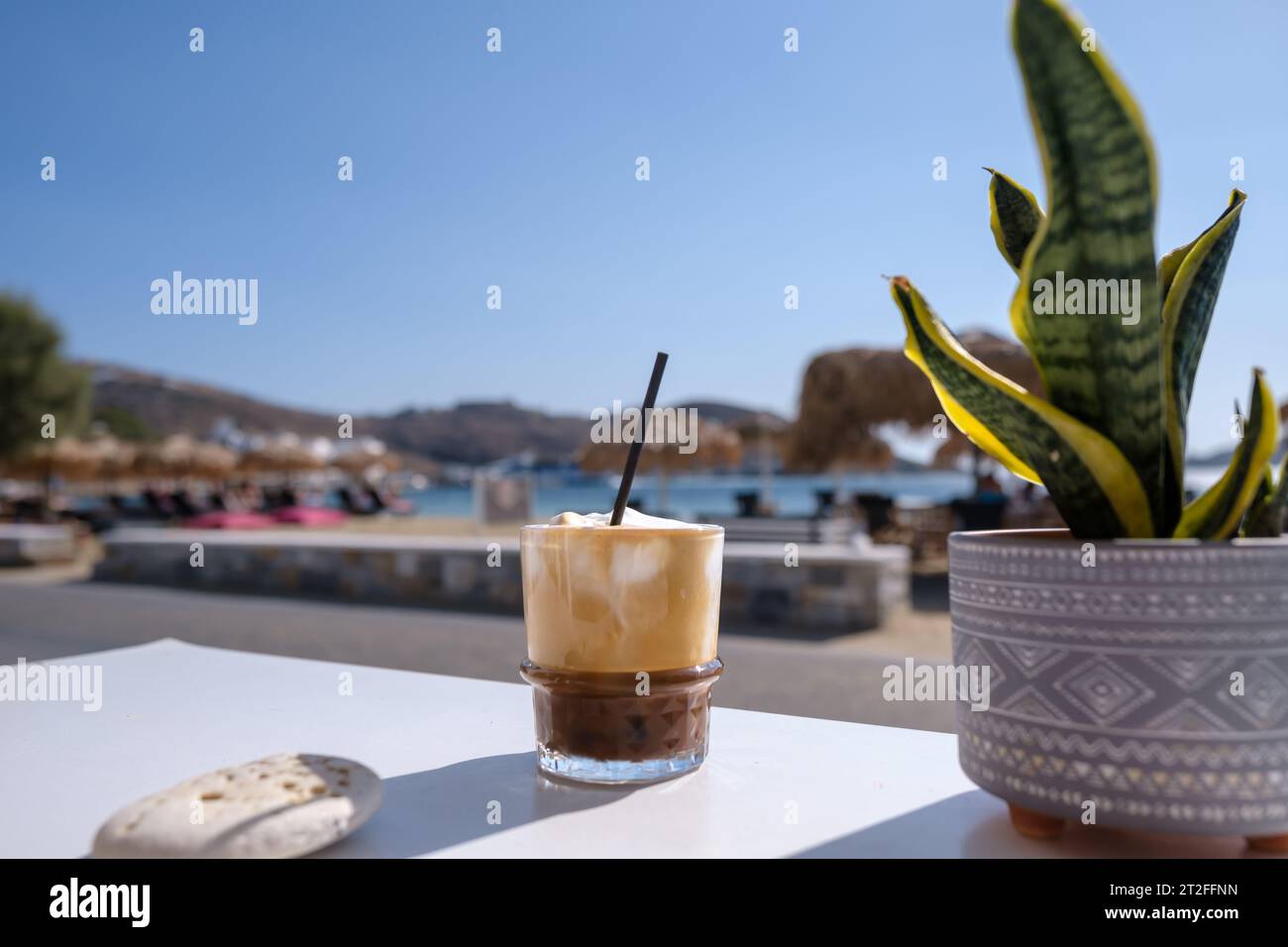 View of an iced Greek coffee, also known as freddo cappuccino with a ...