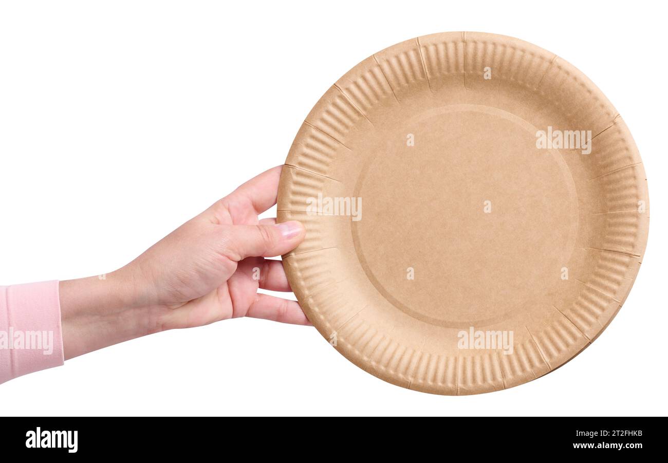 Woman's hand holding a round paper plate Stock Photo - Alamy