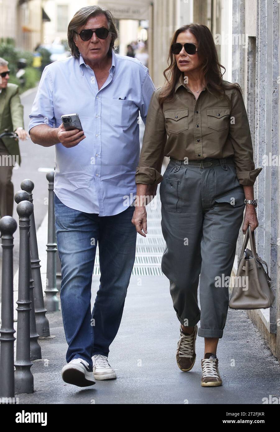 Adriano Panatta and his wife Anna Bonamigo walking in the fashion ...