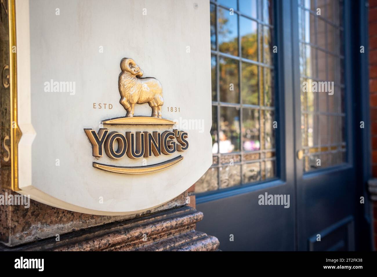 London- October 10, 2023: Youngs Pub logo on exterior of pub in Fulham, south West London Stock ...