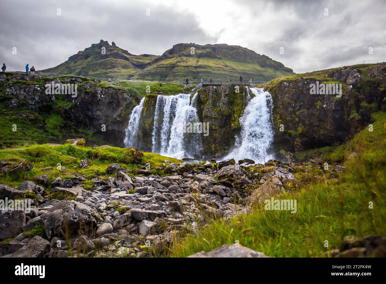 The famous Icelandic mountain Kirkjufell and the small waterfalls Stock ...