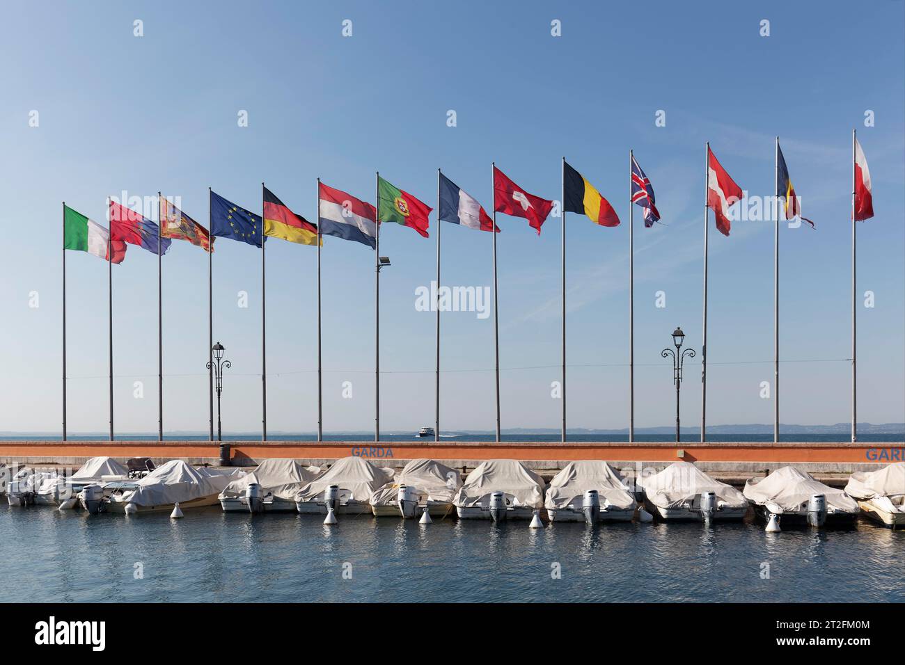Boat harbour with flags of European countries, Garda, Lake Garda ...