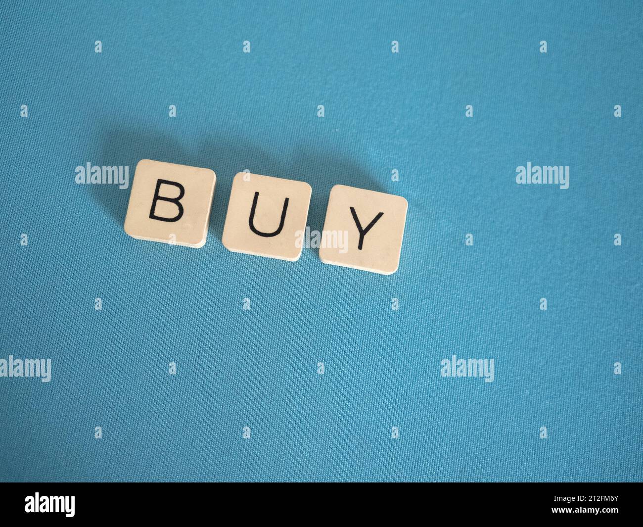 Alphabet blocks, money hi-res stock photography and images - Alamy