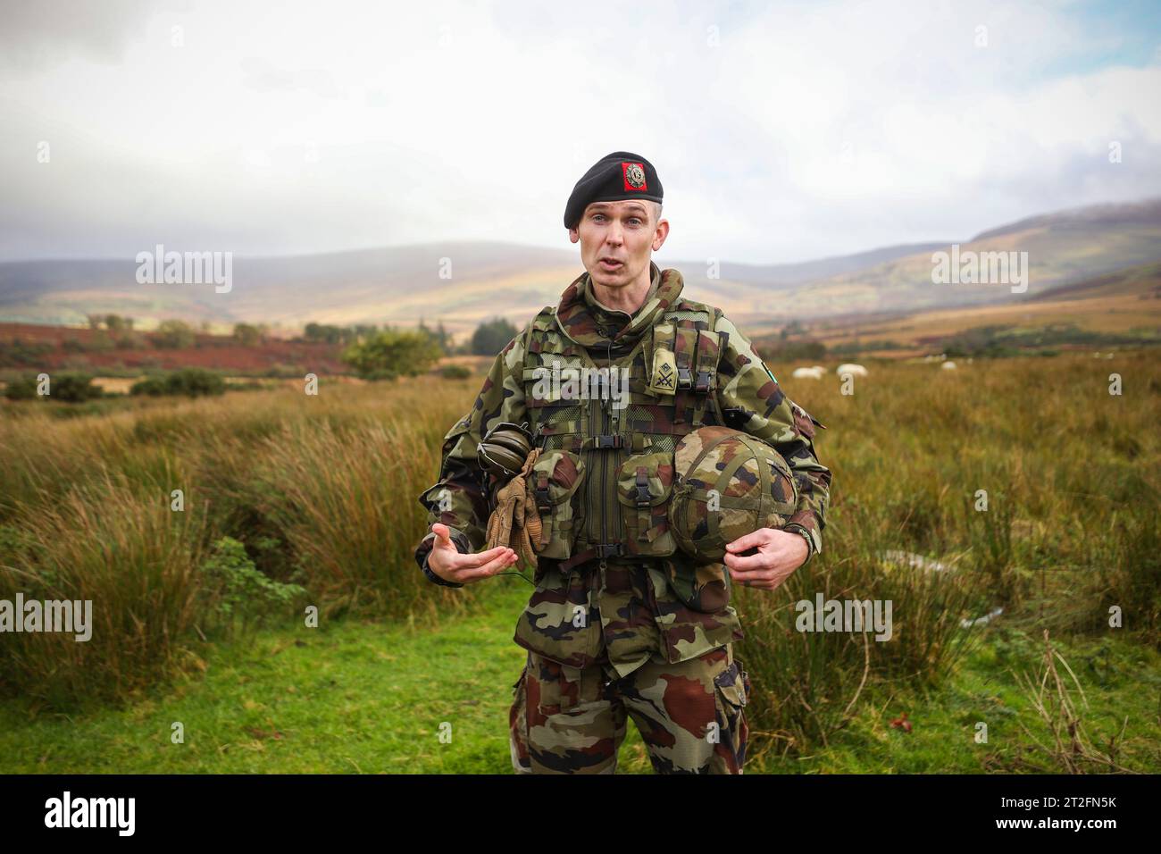 Lieutenant colonel Stephen MacEoin speaking with media during a ...