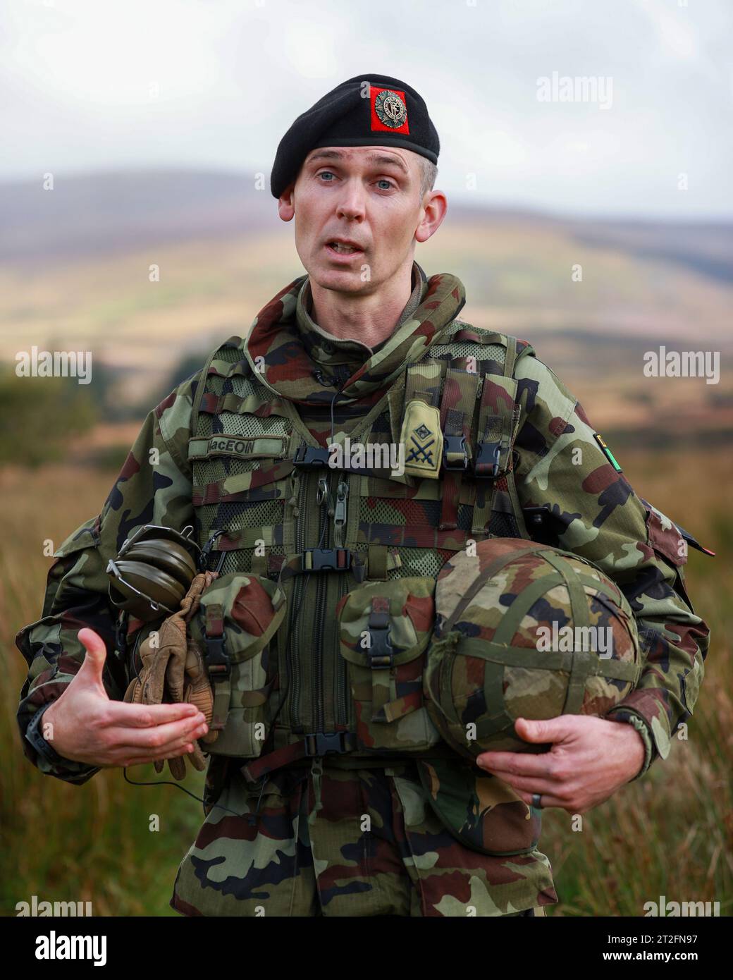 Lieutenant colonel Stephen MacEoin speaking with media during a ...
