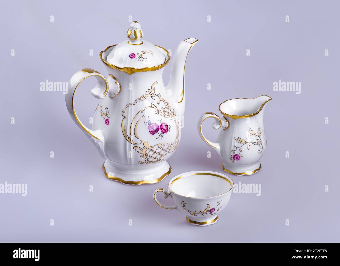 An old German earthenware tea (coffee) set with a teapot, a milk cup ...